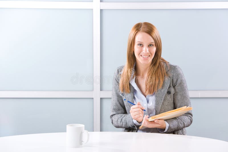 Business Woman Writing Notes at Desk Stock Photo - Image of ...