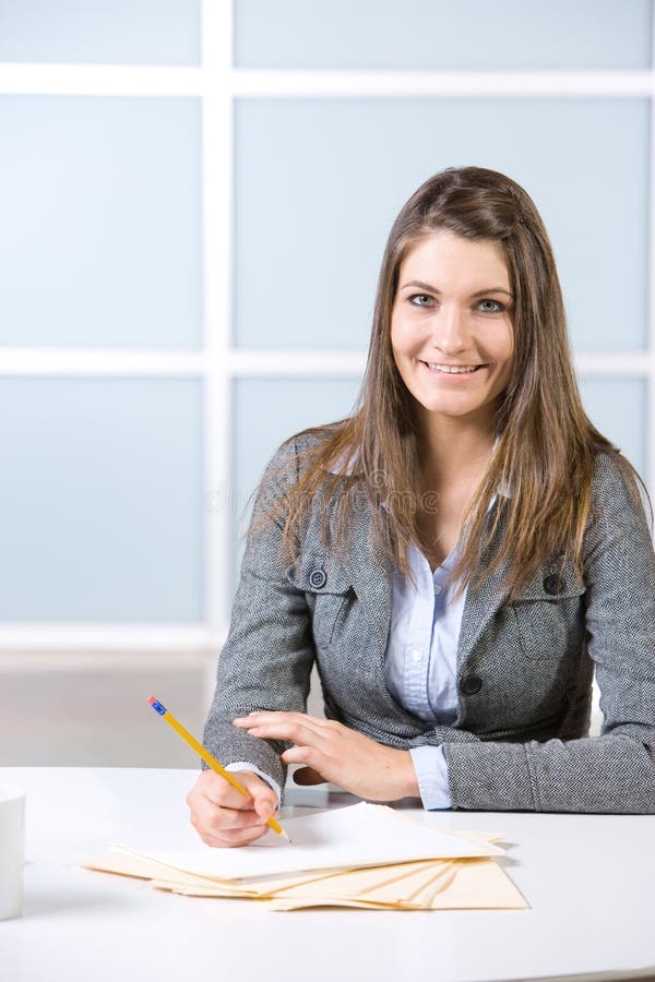 Business Woman Writing Notes at Desk Stock Photo - Image of female ...