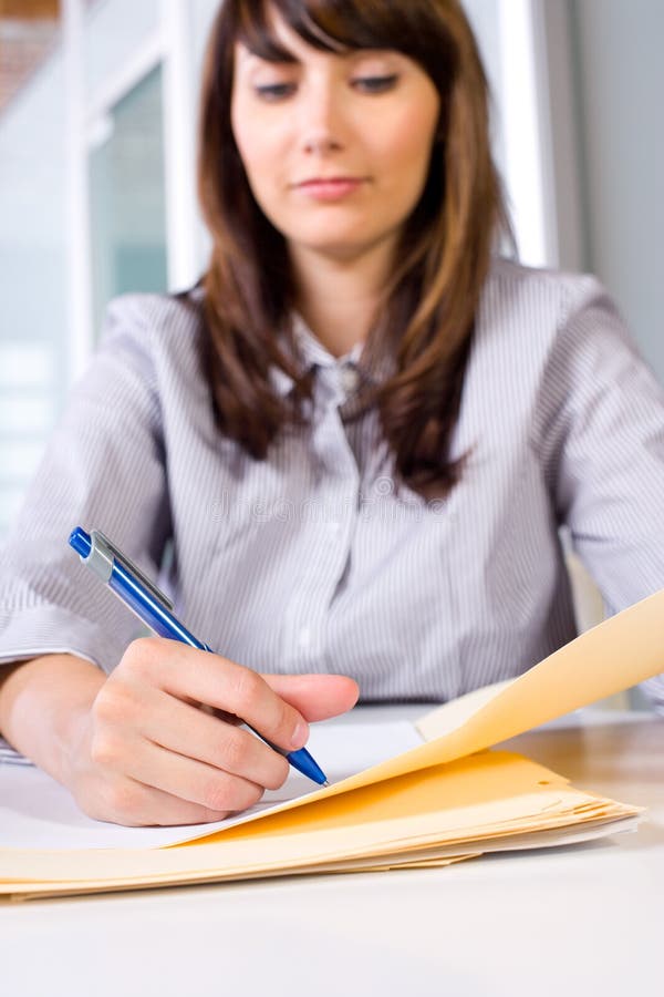 Business Woman Writing Notes at Desk Stock Image - Image of document ...