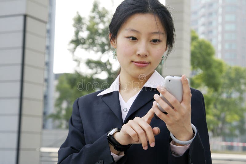 Business Women Holding a Mobile Phone Stock Photo - Image of corporate ...