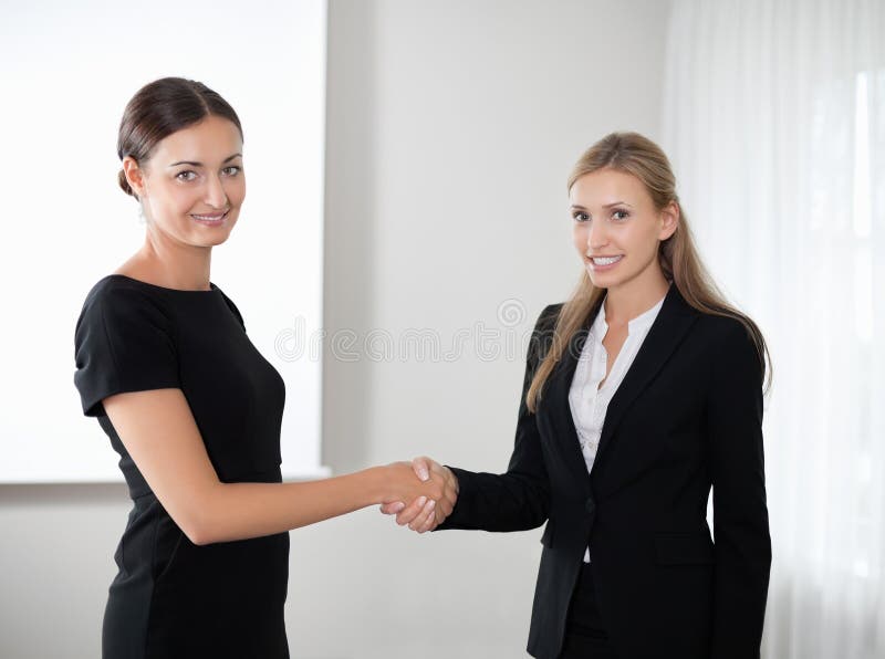 Business Women Shaking Hands Making a Deal Stock Image - Image of ...