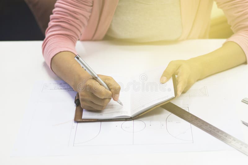 Business Women are Sitting Writing Future Office Building Projects ...