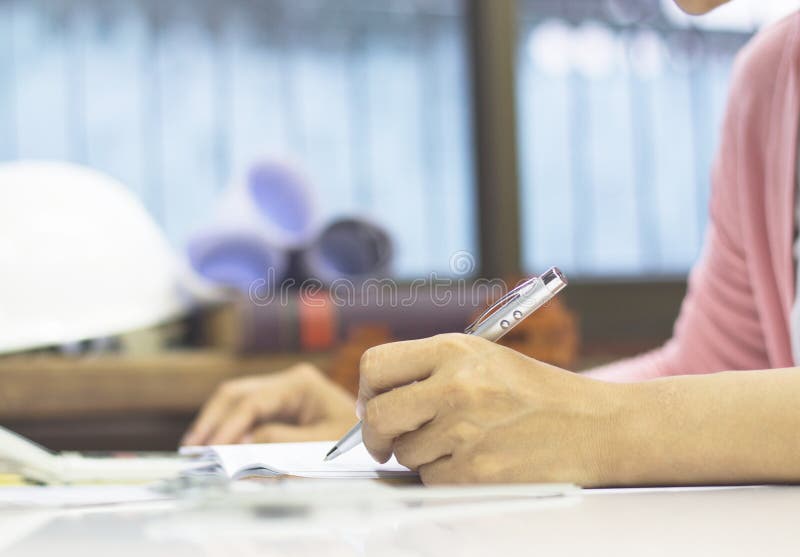 Business Women are Sitting Writing Future Office Building Projects ...