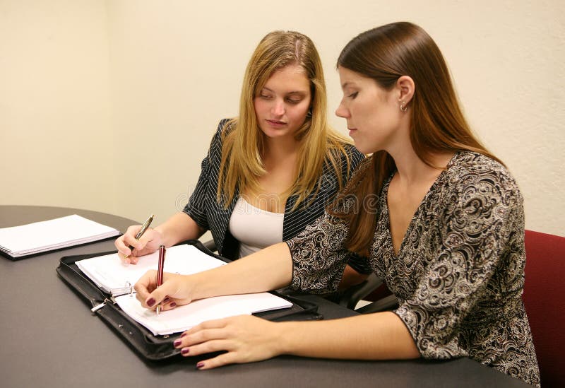 Business Women Taking Notes Stock Image - Image of notes, paper: 1447569