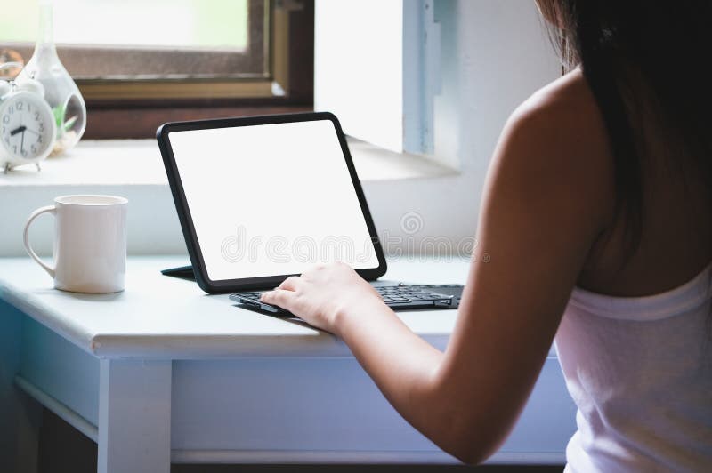 Business Women Use a Tablet for Work, a Blank Tablet Screen Can Add ...