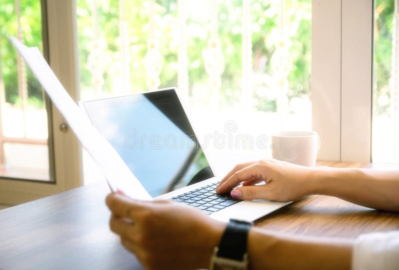 Business Work and Computer Technology the Desk Notebook on Wood Table ...