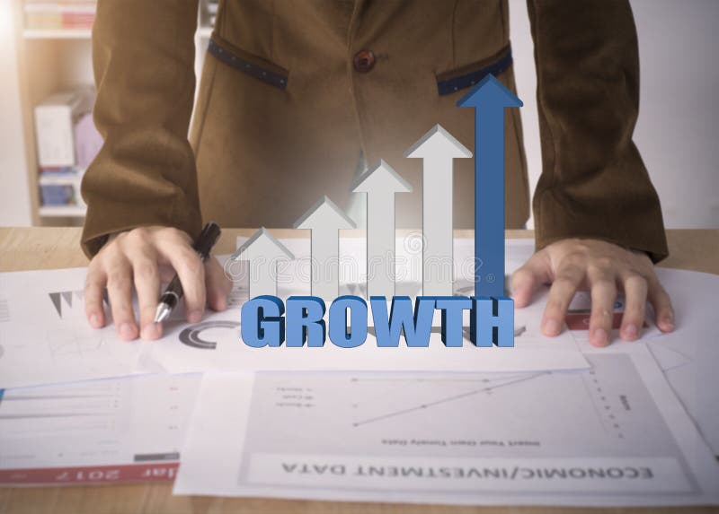 Business Worker with Graph Growth on Desk Office. Stock Photo - Image ...