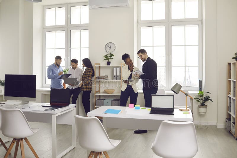 Diverse Business Team Conversation at Bright Office View from Distance ...