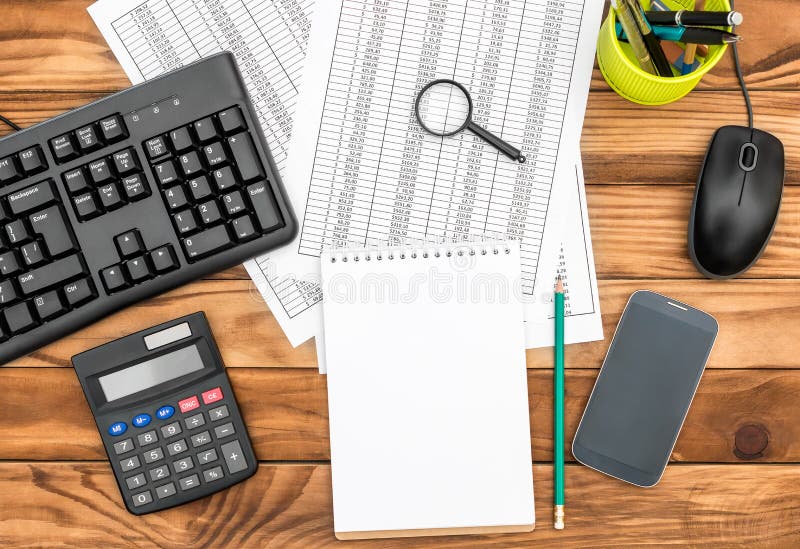 Paper Financial Graphs and Charts with Calculator, Magnifying Glass and ...