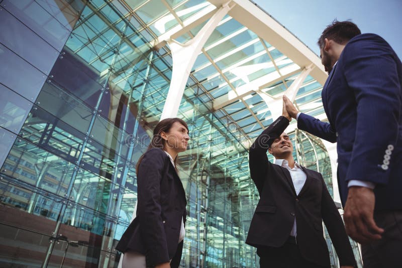 Businesses Executives Giving High Five To Each Other Stock Photo ...