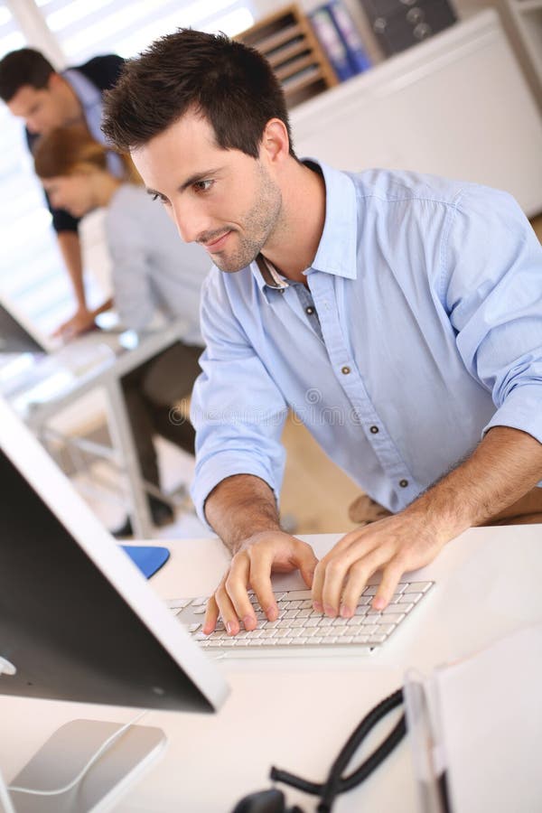 Businessman in Action in Office Stock Image - Image of businessman ...