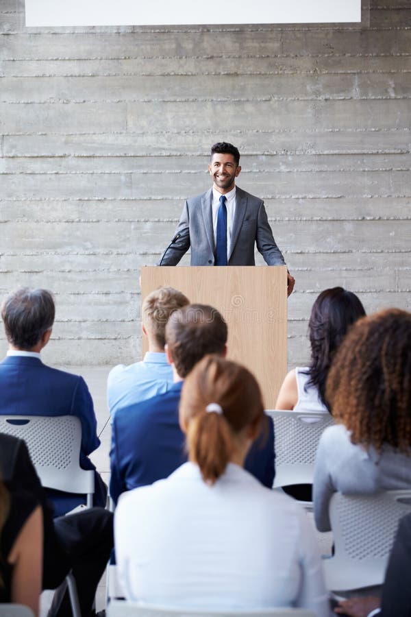 Businessman Addressing Multi-Cultural Office Staff Meeting Stock Image ...