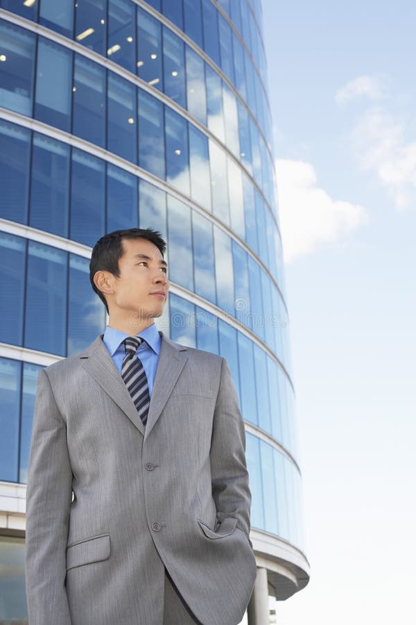 Businessman Against Office Building Stock Image - Image of office, male ...
