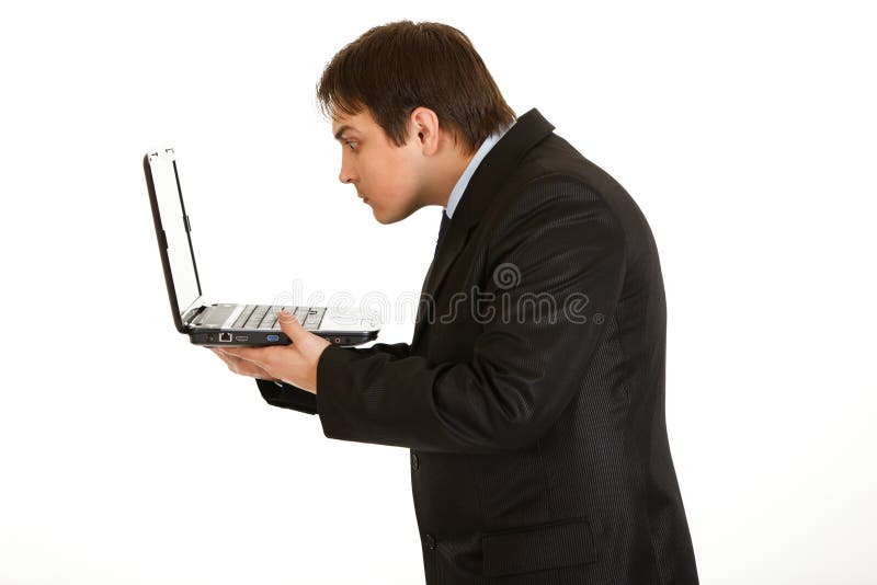 Businessman Amazedly Looking in Laptops Screen Stock Photo - Image of ...