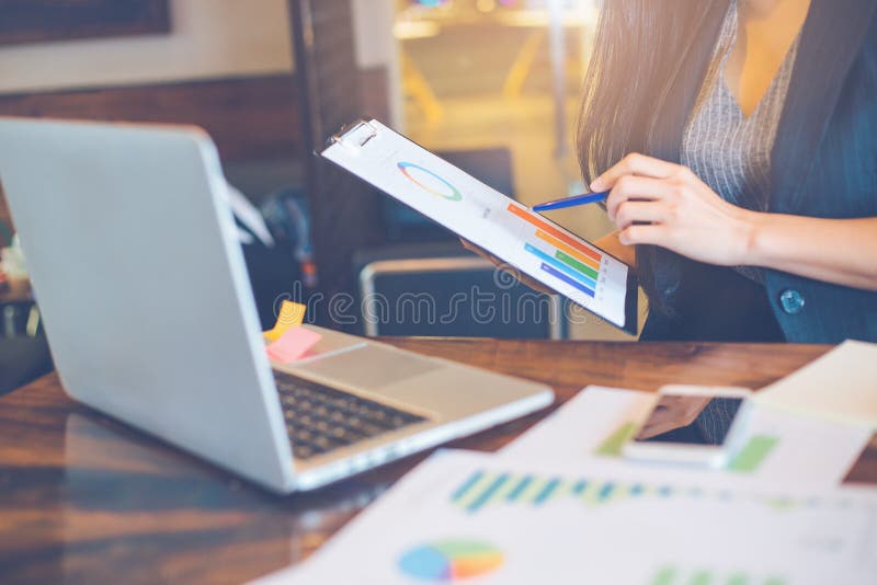 Businessman Analysis Working Discussing the Charts and Graphs Sh Stock ...