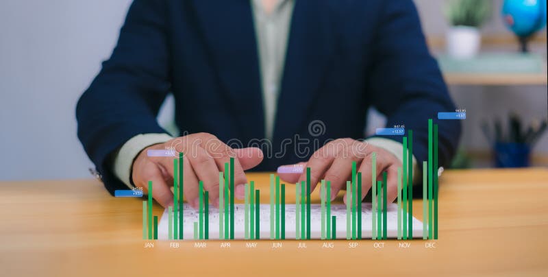 Businessman Analyzing Company Growth Using a Laptop and Tablet, with ...