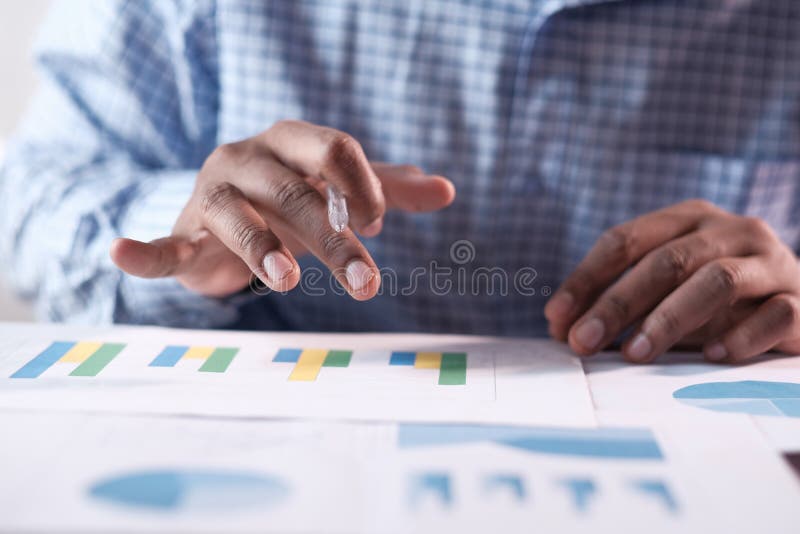 Businessman Analyzing Financial Chart on Paper Stock Image - Image of ...