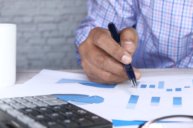 Businessman Analyzing Financial Data with Copy Space Stock Photo ... Businessman Analyzing Financial Data with Copy Space Stock Photo ...