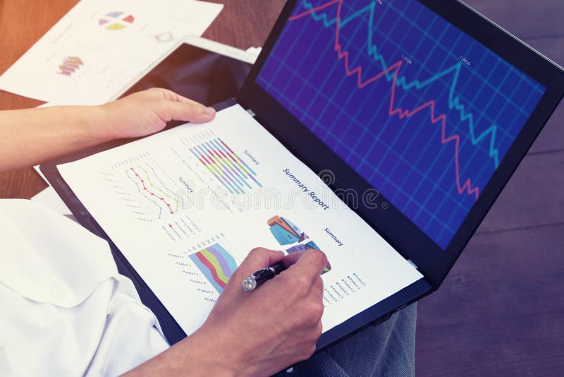 Businessman Analyzing Financial Performance.summary Report. Stock Photo ...