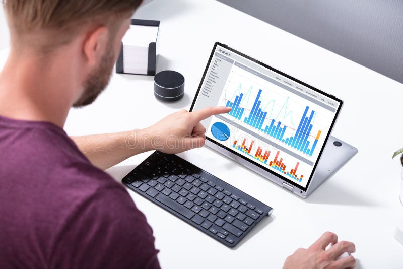 Businessman Analyzing Graph on Computer Stock Photo - Image of desk ...