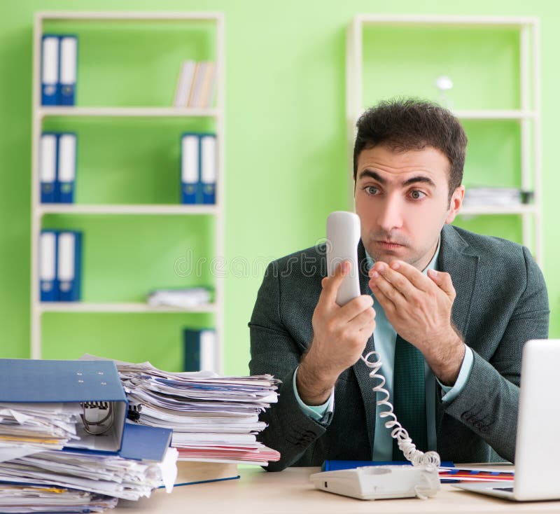 Businessman Angry with Excessive Work Sitting in the Office Stock Image ...