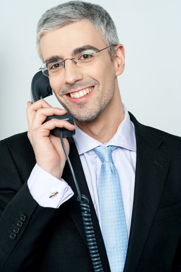 Smart Guy Answering the Phone Call Stock Image - Image of smart, smile ...
