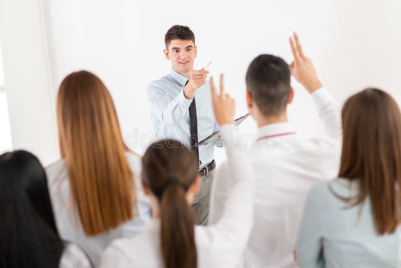 Businessman Answering the Questions Stock Image - Image of meeting ...