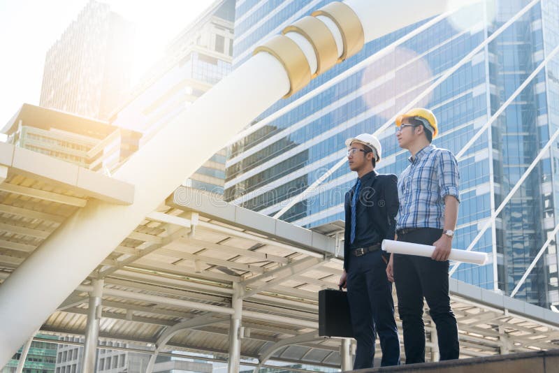 Businessman and Architect Planning Construction Project Stock Photo ...