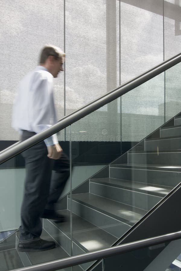Businessman Ascending Stairs Stock Photo - Image of walk, walking: 6100210