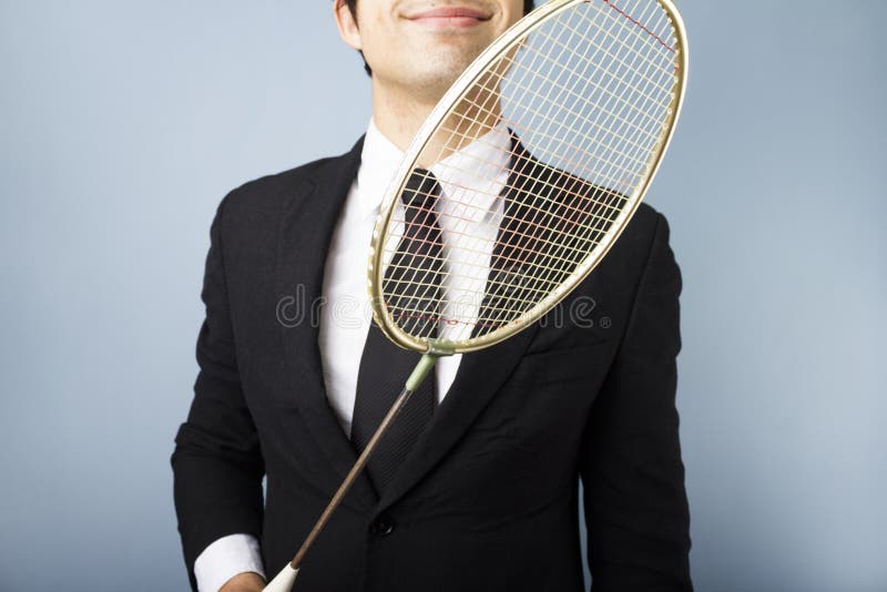 Businessman with Badminton Racket Stock Image - Image of holding ...