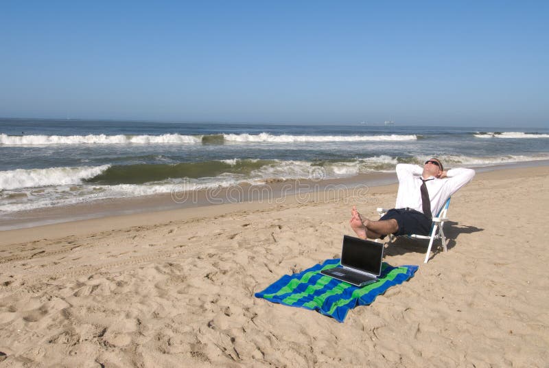 Businessman on Beach Working Stock Image - Image of sand, employee: 4691395
