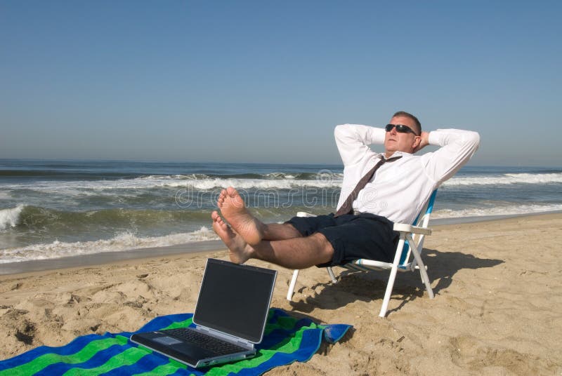 Businessman on Beach Relaxing Stock Photo - Image of businessman, male ...