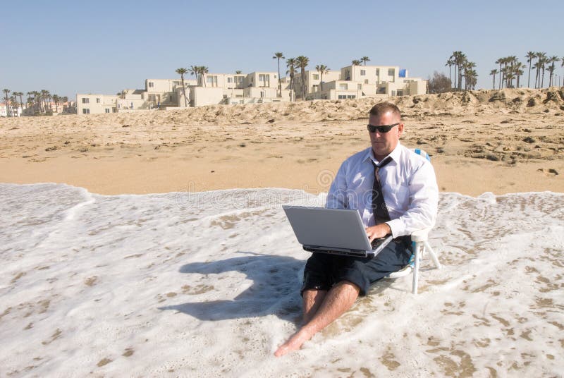 Businessman on Beach Working Stock Image - Image of sand, employee: 4691395