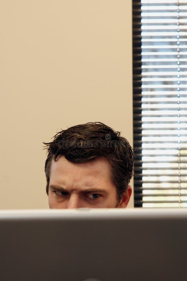 Businessman Behind Laptop - Angry Stock Image - Image of working ...