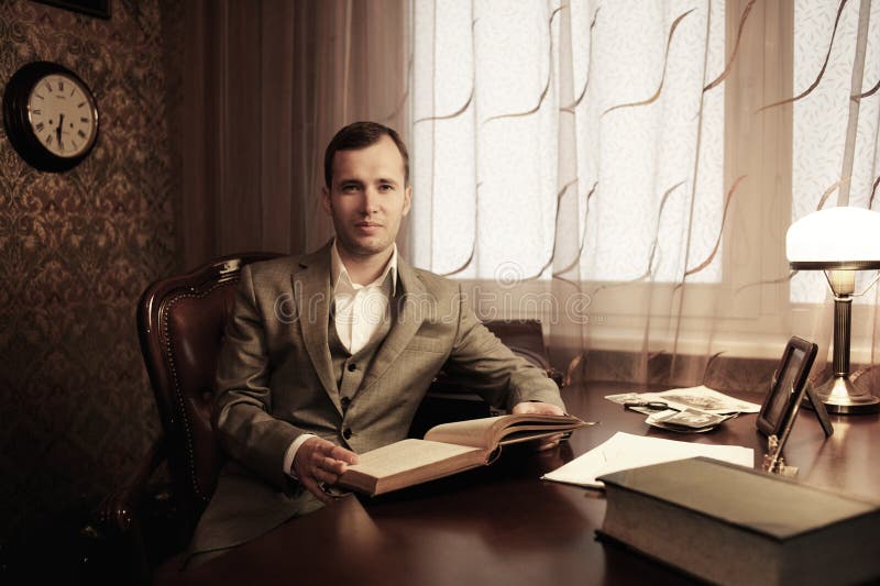 Businessman behind table stock photo. Image of elegant - 27592042