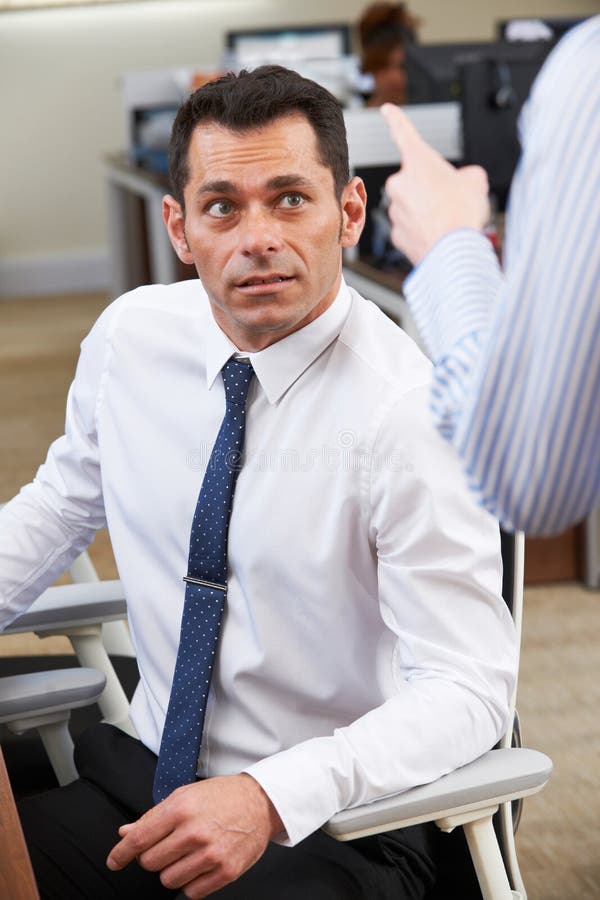Businessman Being Shouted at by Female Colleague Stock Photo - Image of ...