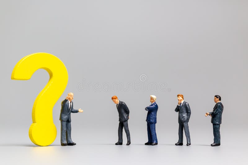 Businessman with Big Question. Workers Trying To Solve the Problem ...
