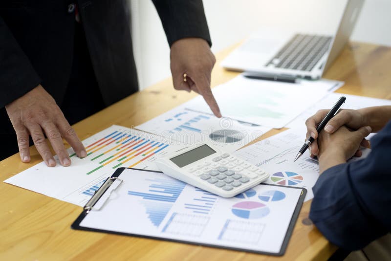 Businessman Boss of the Team Point To Graph and Chart Stock Image ...