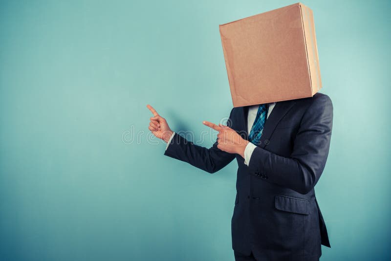 Businessman with Box on Head is Pointing Stock Image - Image of hidden ...