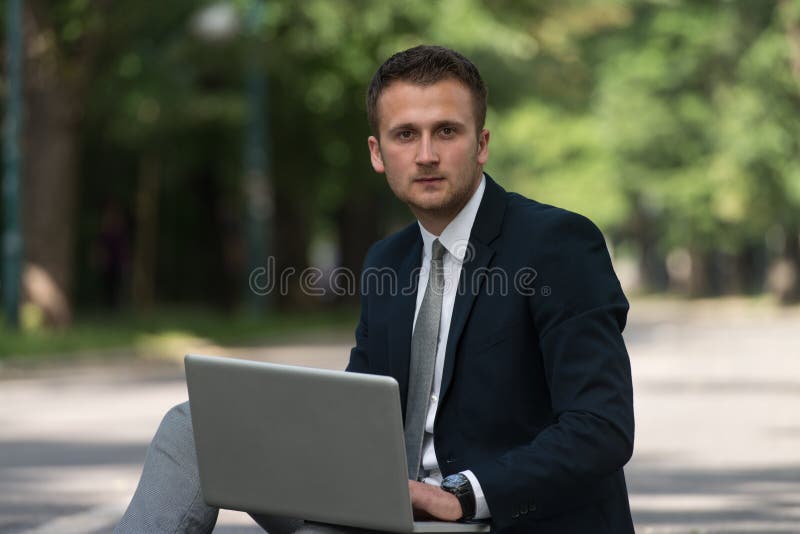 Businessman on a Break with His Computer Stock Photo - Image of office ...