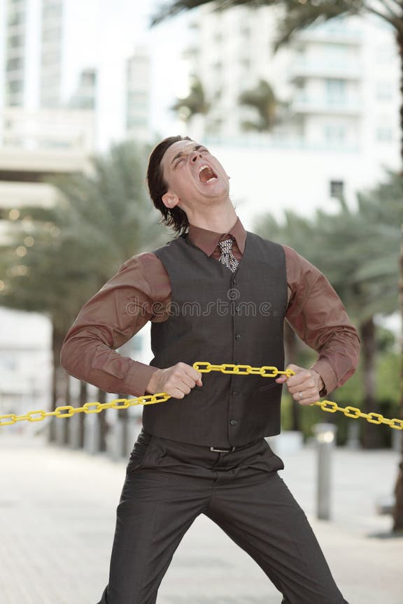 Businessman Breaking the Chain Stock Photo - Image of vertical, modern ...