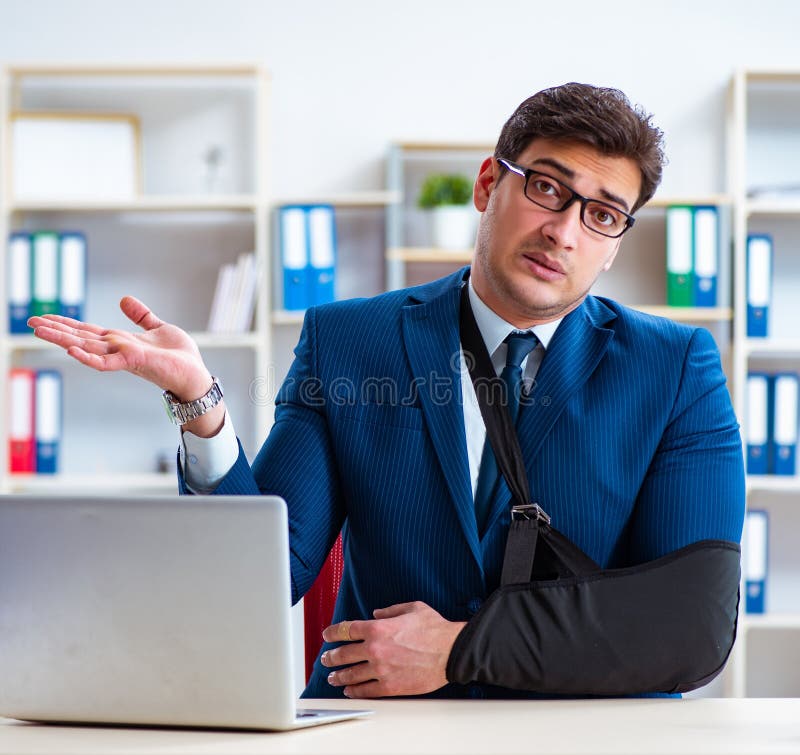 Businessman with Broken Arm Working in Office Stock Image - Image of ...