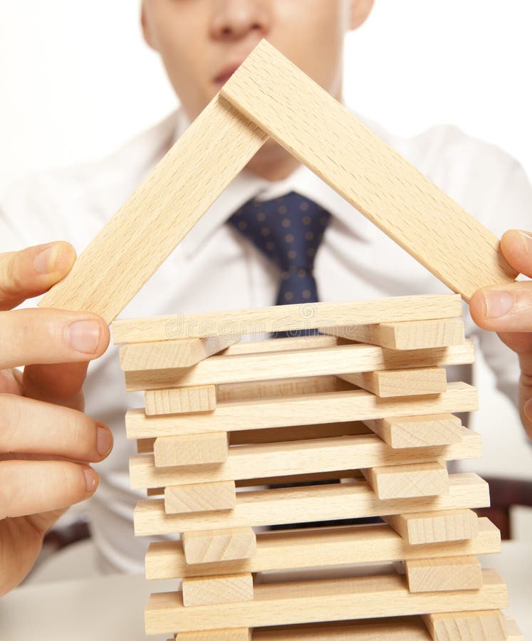 Businessman Building Tower of Wooden Blocks Stock Image - Image of ...