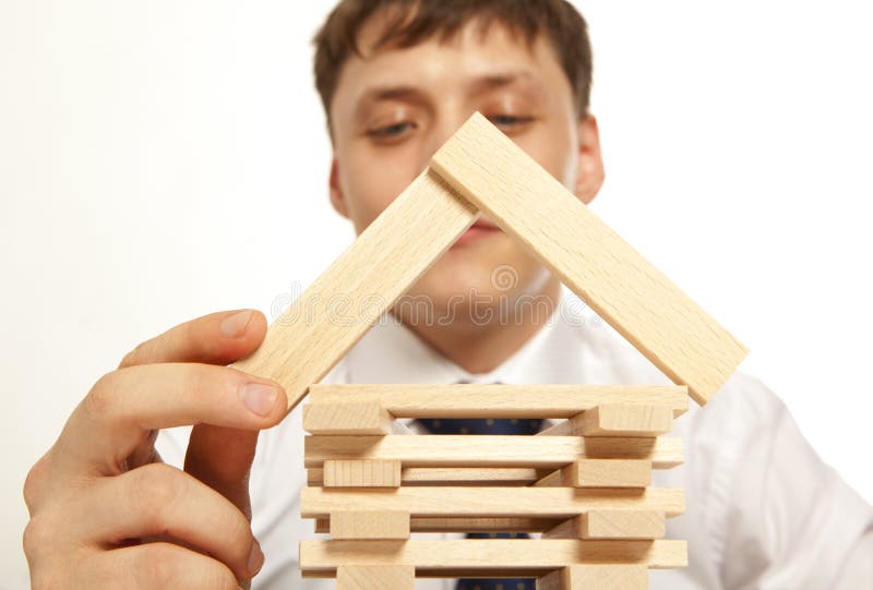 Businessman Building Tower of Wooden Blocks Stock Photo - Image of ...