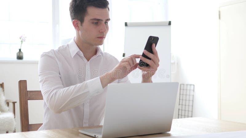Businessman Busy Using Smartphone for Work in Office Stock Image ...