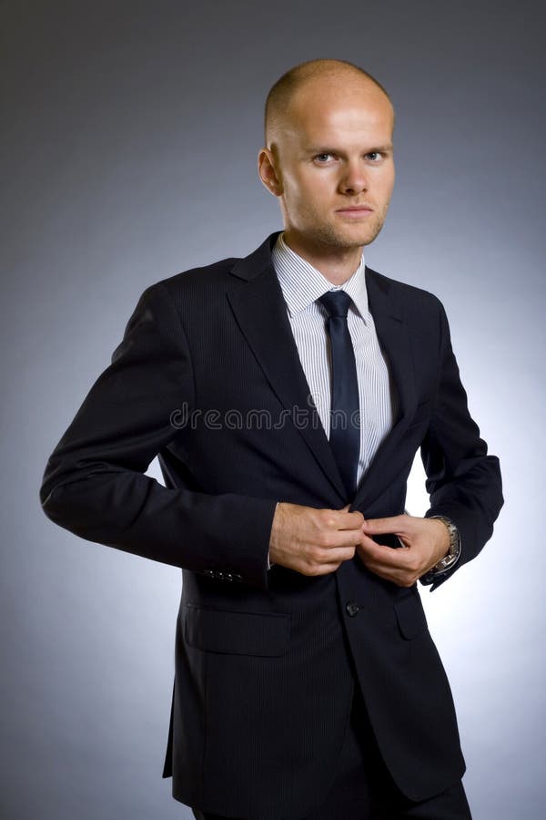 Businessman Buttoning His Coat Stock Photo - Image of party, heart ...