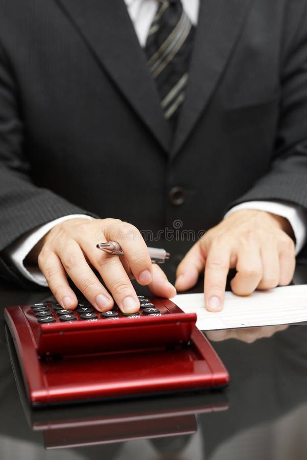 Businessman Calculating Expenses Stock Photo - Image of business ...