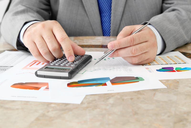 Businessman with Calculator Stock Photo - Image of revenue, business ...