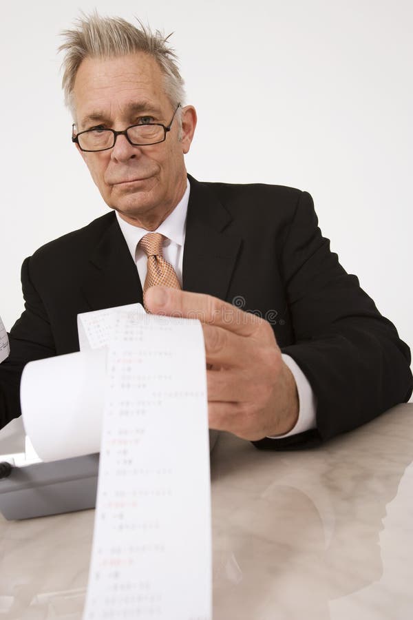 Businessman with Calculator Paper Stock Photo - Image of businessmen ...