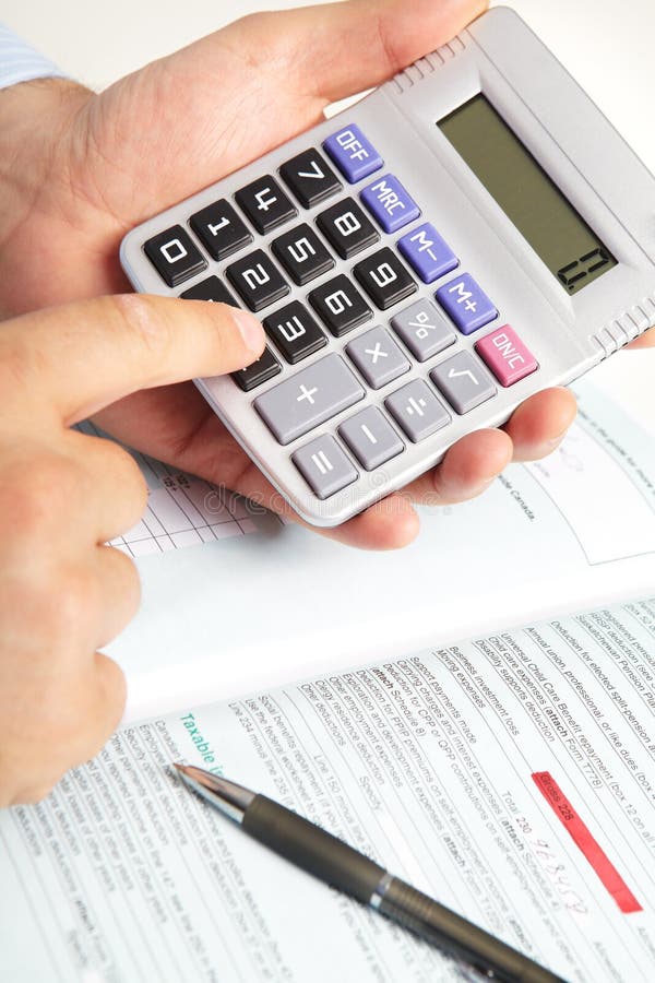 The Businessman and Calculator Stock Image - Image of desk, finance ...
